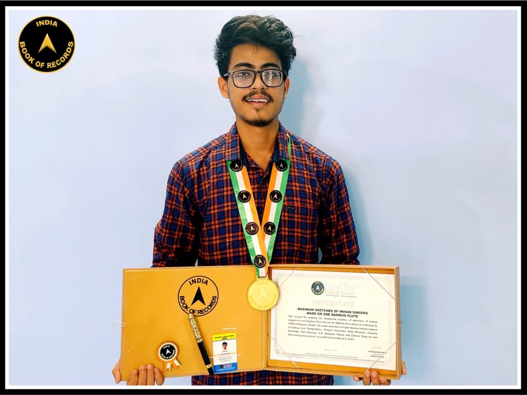 Maximum sketches of Indian singers made on one bamboo flute - India Book of Records