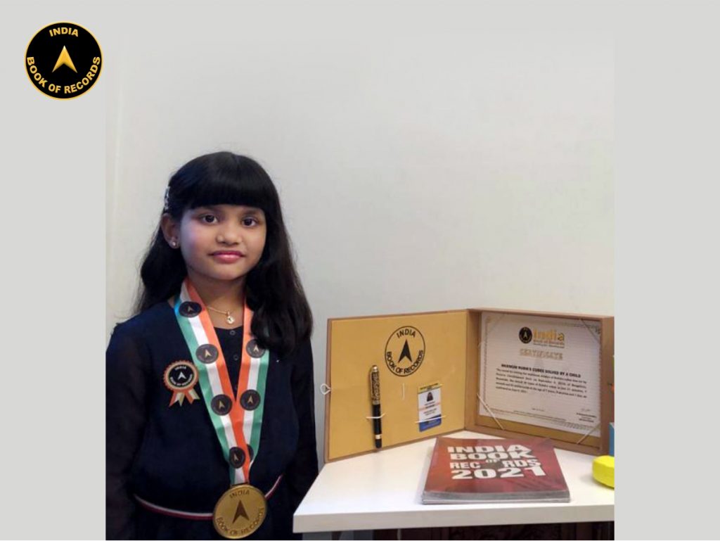 Maximum Rubik's cubes solved by a child - India Book of Records Maximum Rubik's cubes solved by a child - India Book of Records