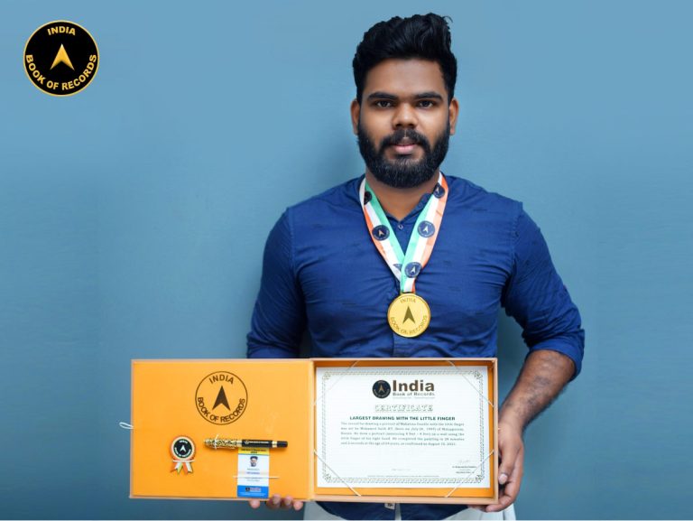 Largest drawing with the little finger - India Book of Records