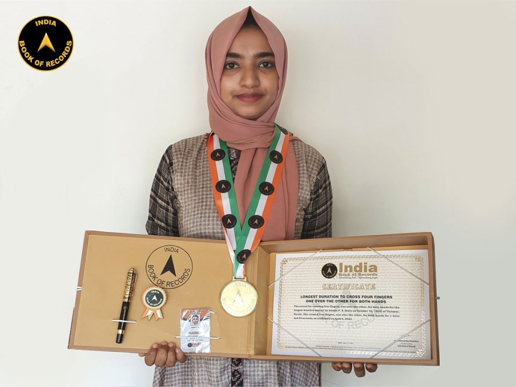 Longest duration to cross four fingers one over the other for both ...