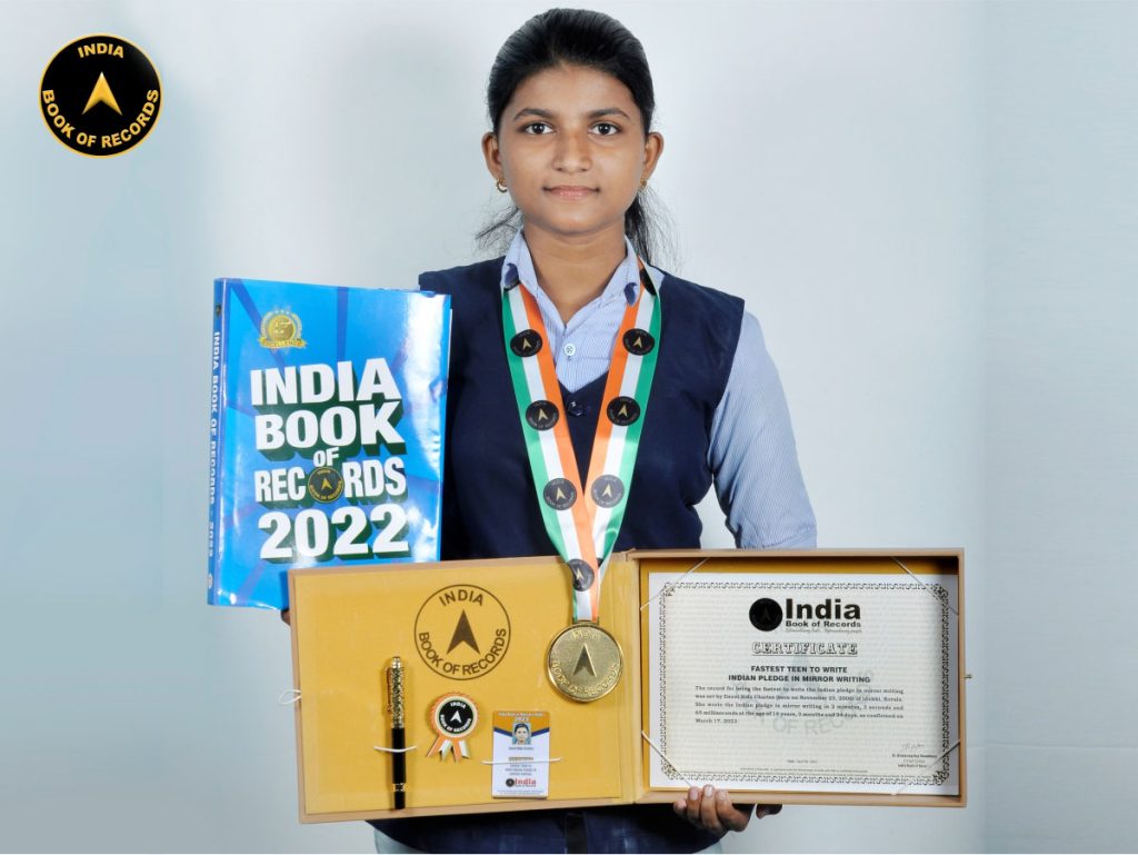 Fastest teen to write Indian pledge in English mirror writing - India ...