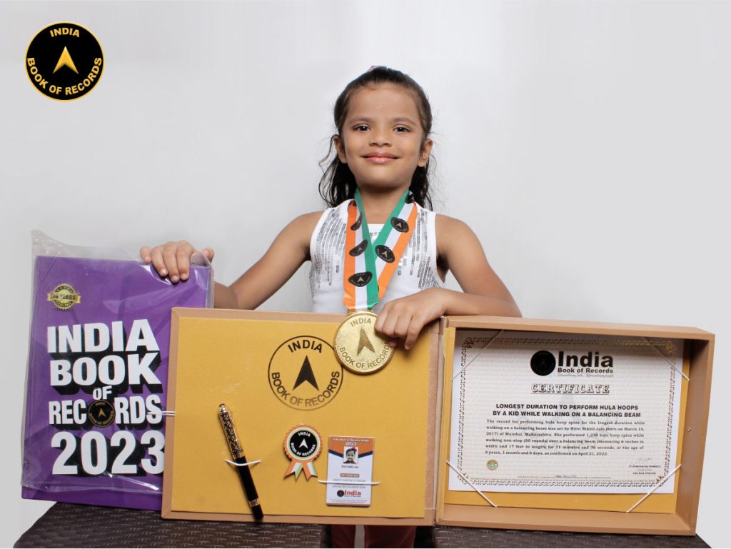 Longest duration to perform hula hoops by a kid while walking on a ...