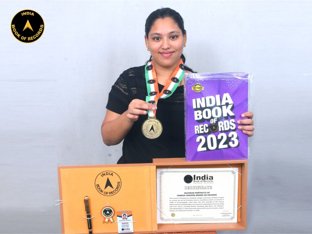 Maximum portraits of famous singers drawn on erasers - India Book of ...