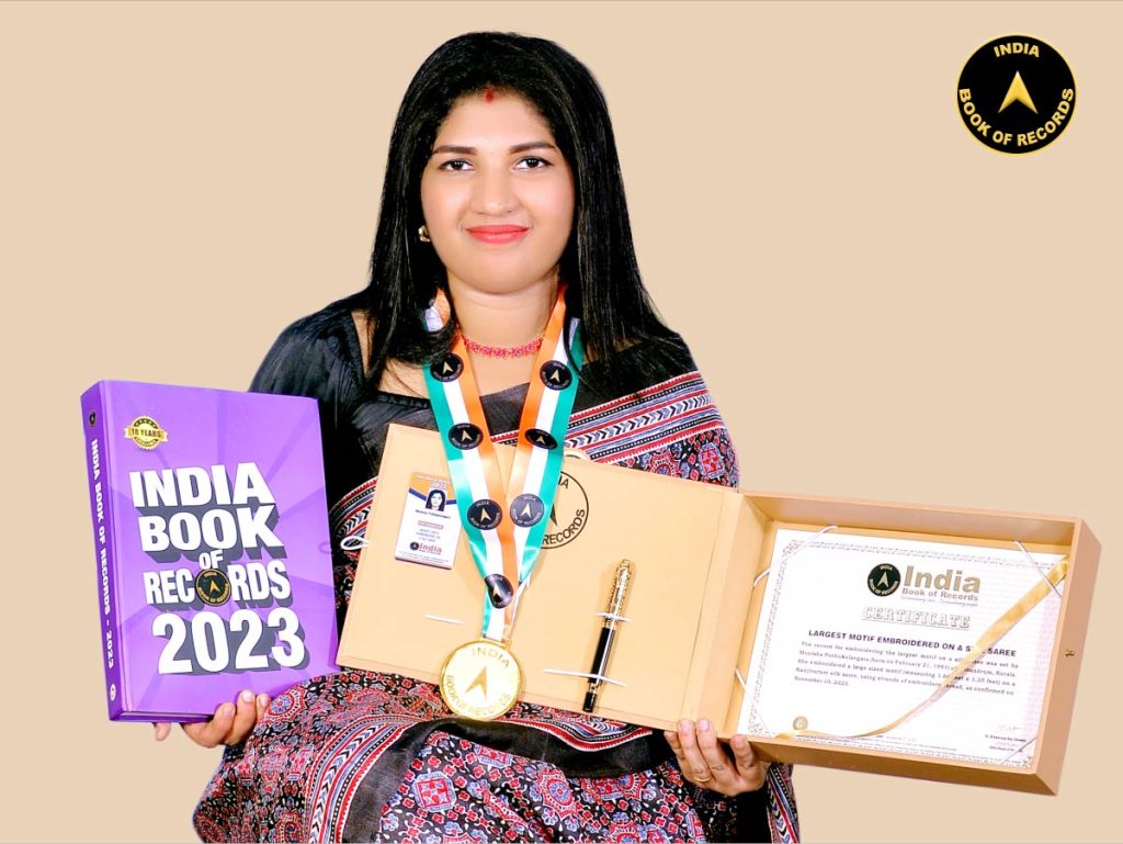 Largest motif embroidered on a silk saree - India Book of Records