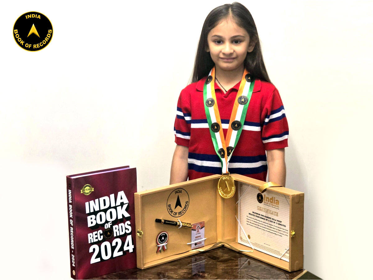 Maximum one-handed hula hoop weaves performed by a kid in 15 minutes ...