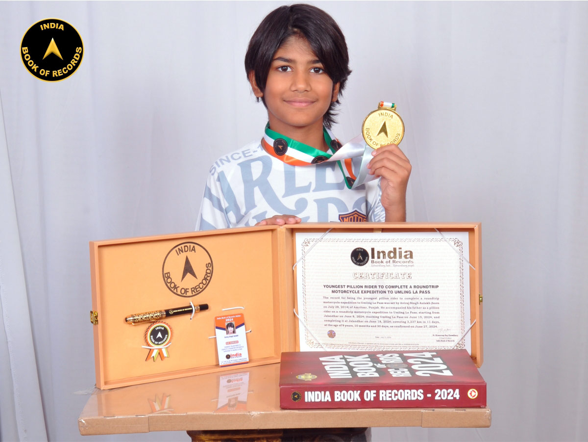 Youngest pillion rider to complete a roundtrip motorcycle expedition to ...