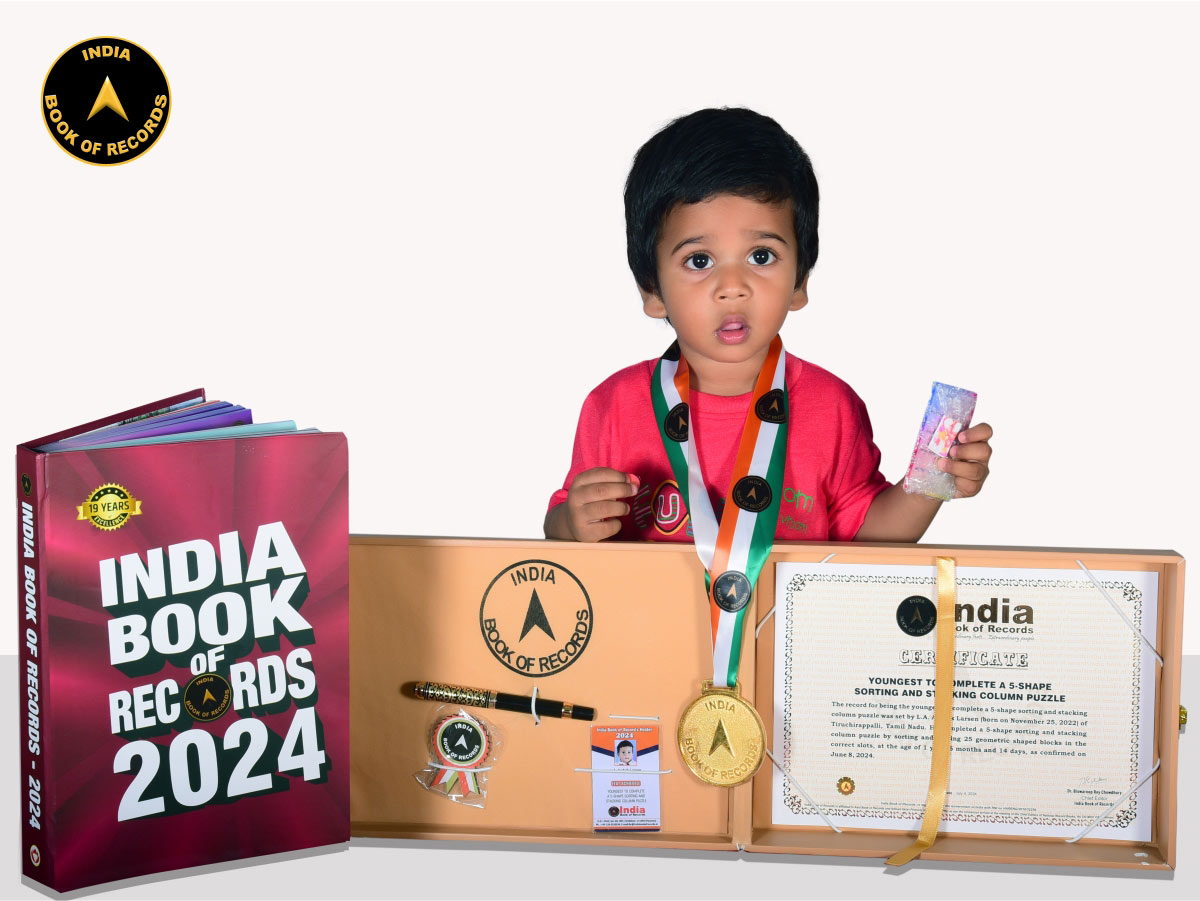 Youngest to complete a 5-shape column puzzle