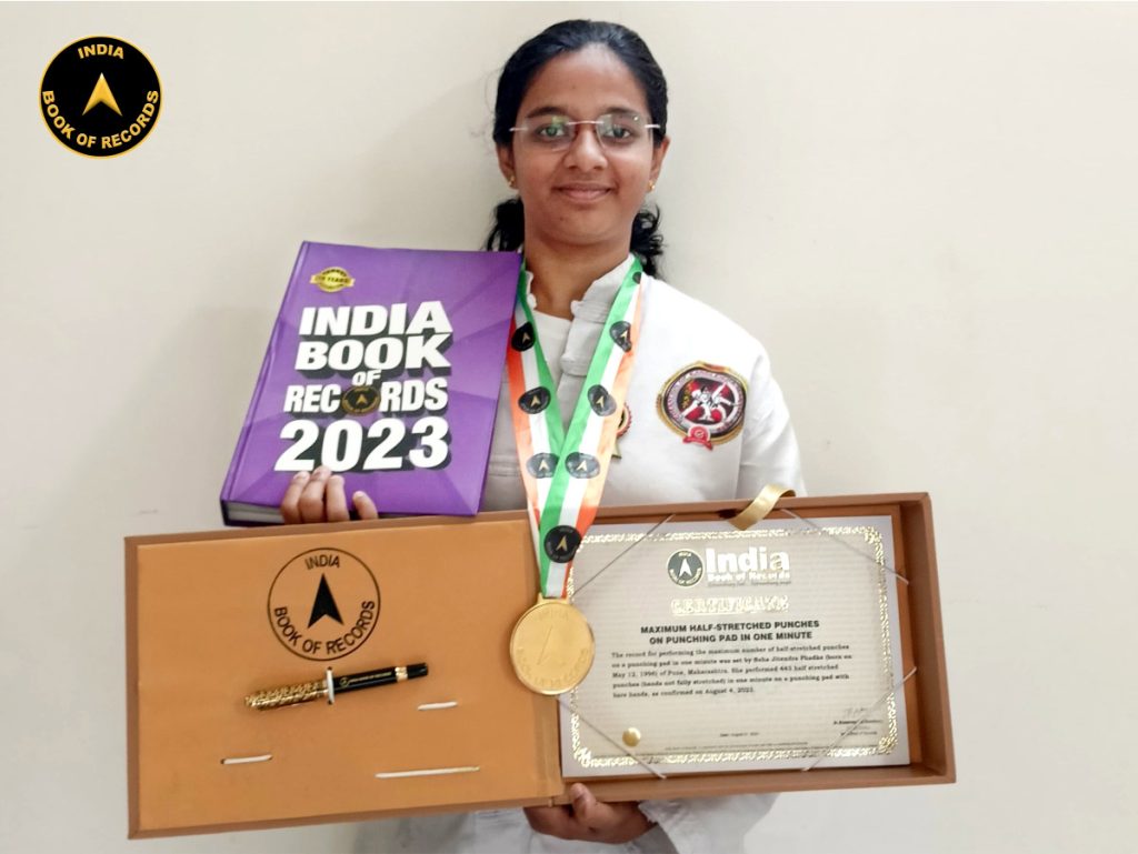 Maximum half-stretched punches on punching pad in one minute - India Book of Records