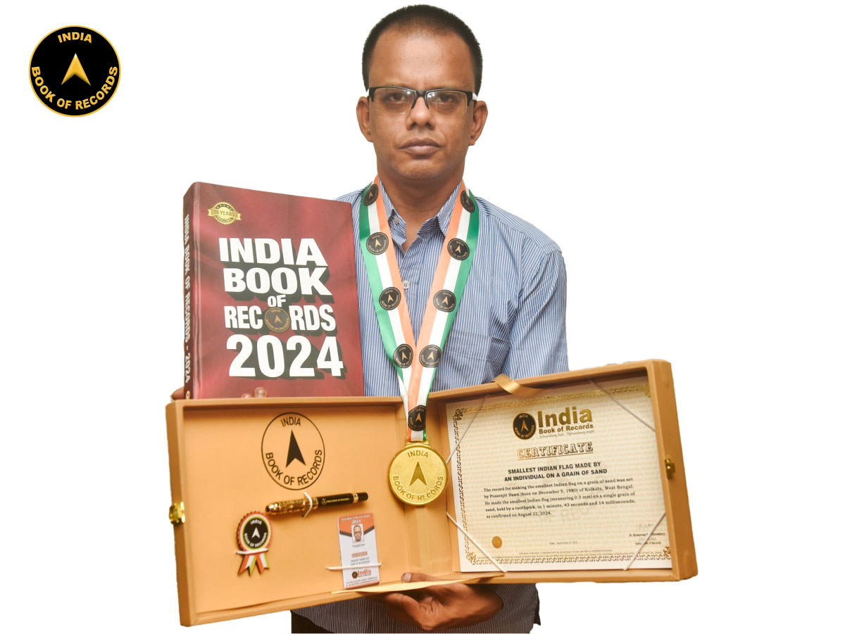 Smallest Indian flag made by an individual on a grain of sand - India ...
