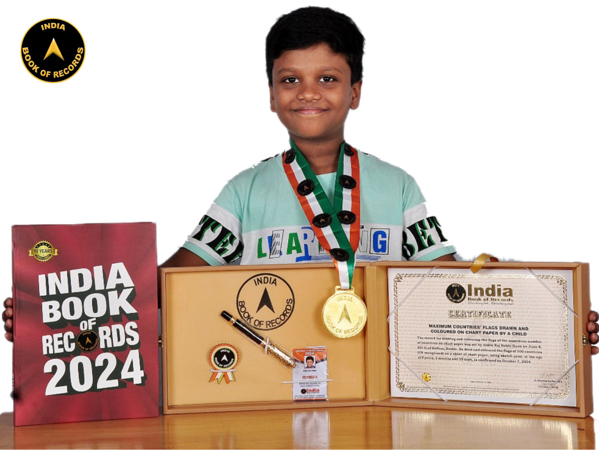 Maximum countries’ flags drawn and coloured on chart paper by a child - India Book of Records