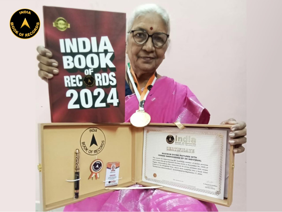 Maximum divine pictures with verses embroidered - India Book of Records