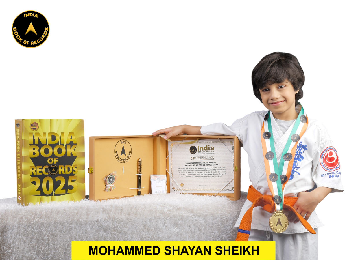 Maximum marble tiles broken by a kid using round-house kicks - India Book of Records
