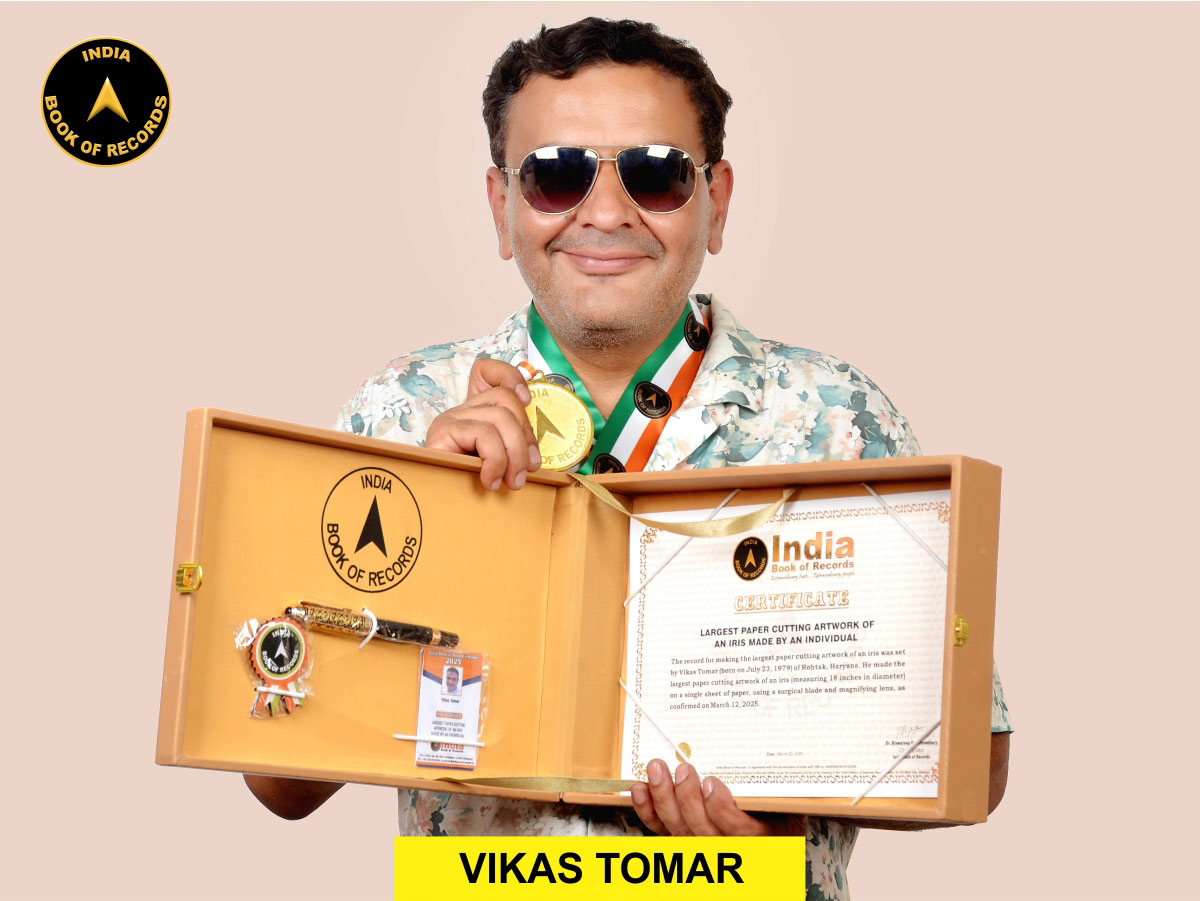 Largest paper cutting artwork of an iris made by an individual - India Book of Records