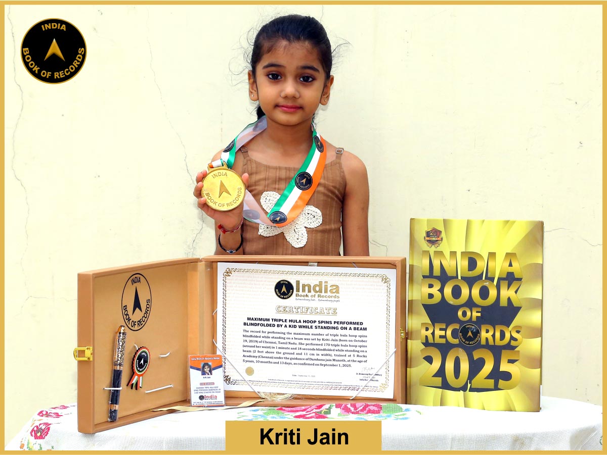 Maximum triple hula hoop spins performed blindfolded by a kid